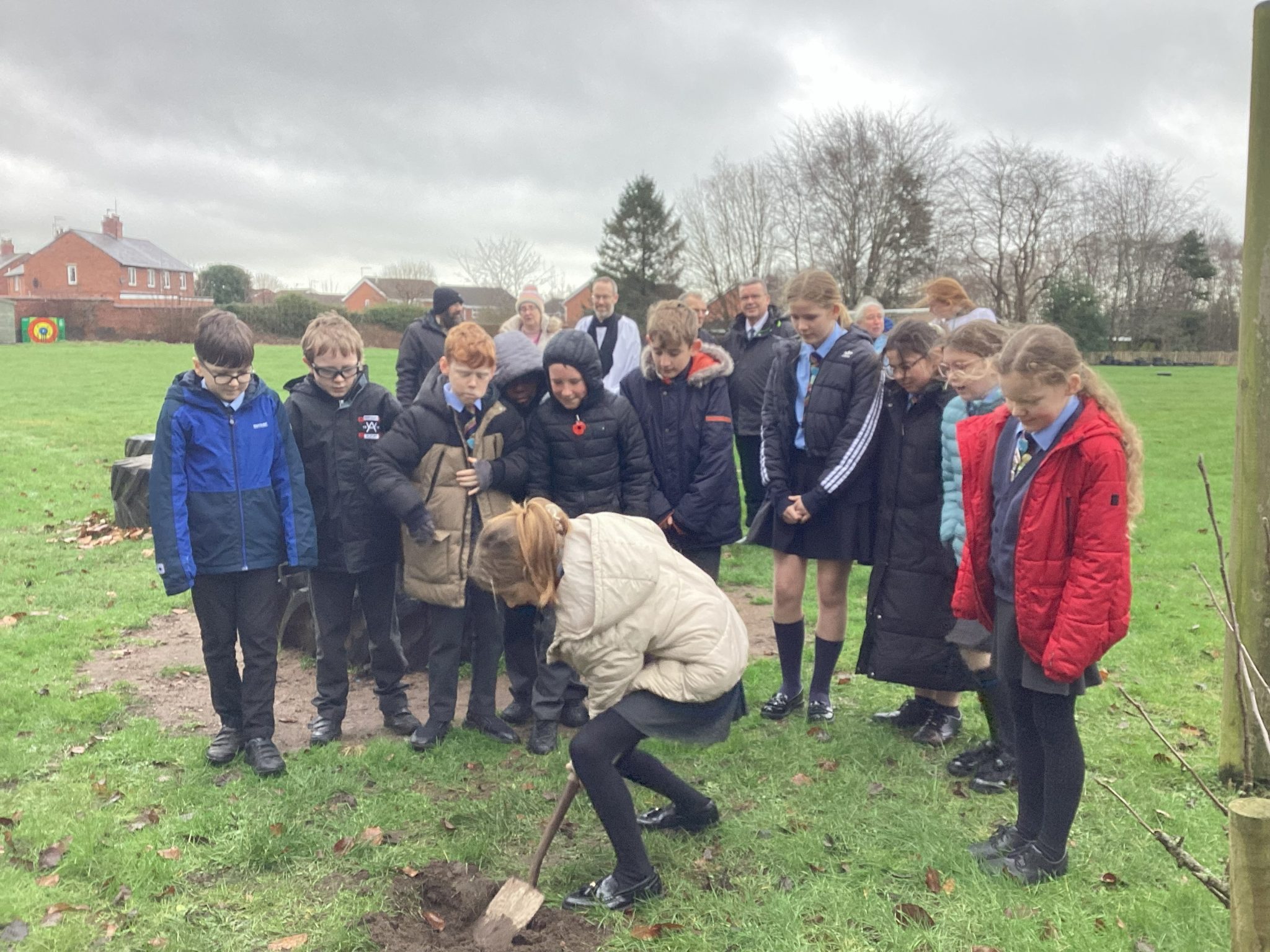 Children planting the tree - Shropshire Council Newsroom